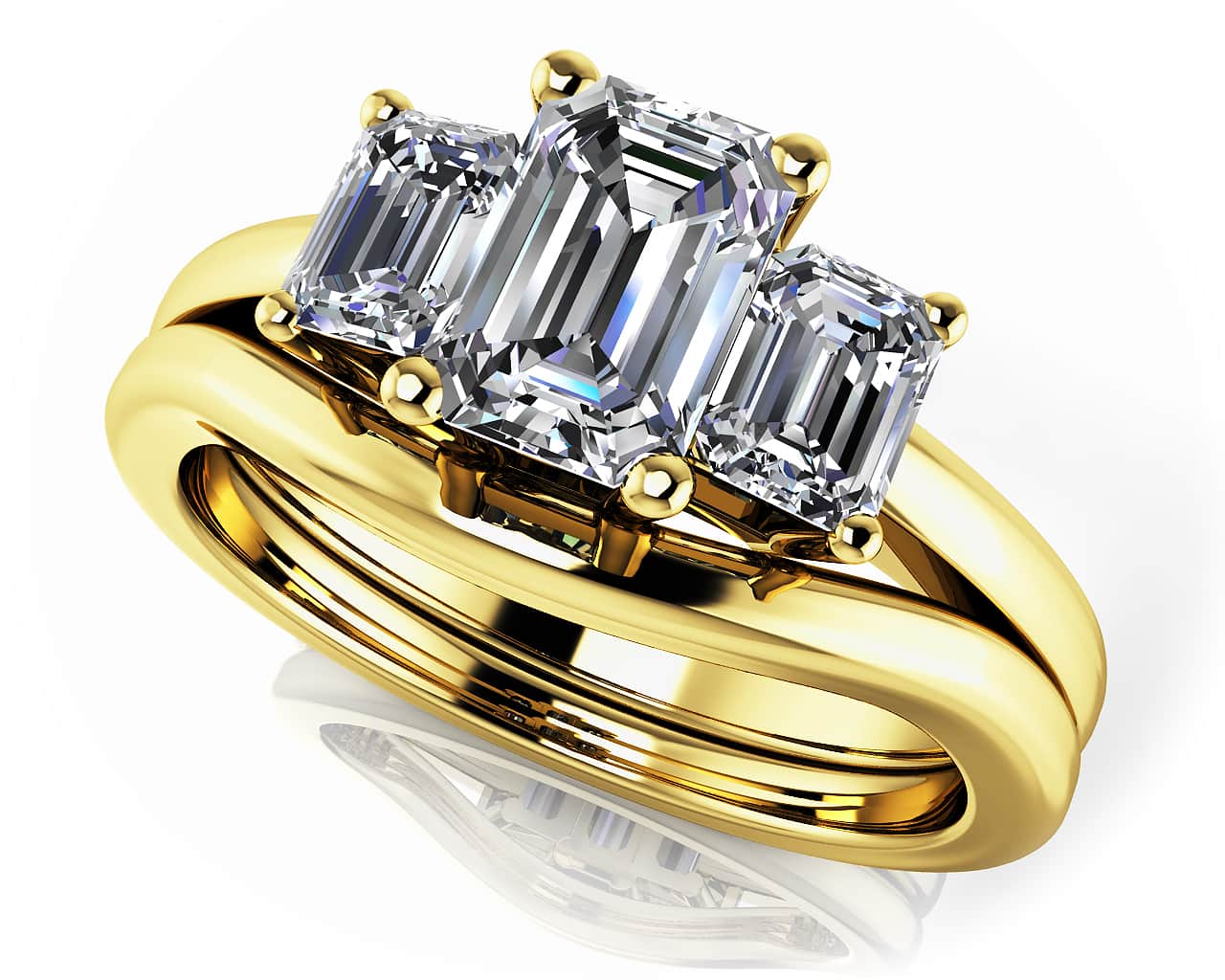 Elegant Three Stone Emerald Diamond Bridal Set